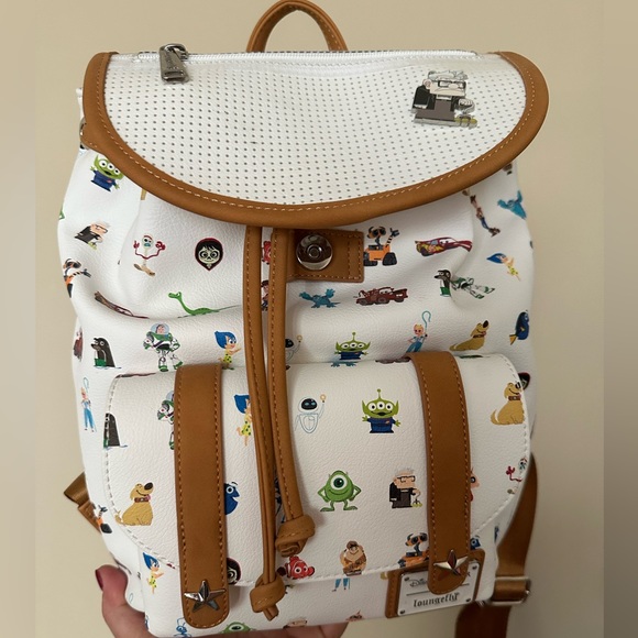 Loungefly | Bags | Pixar Loungefly Pin Backpack | Poshmark